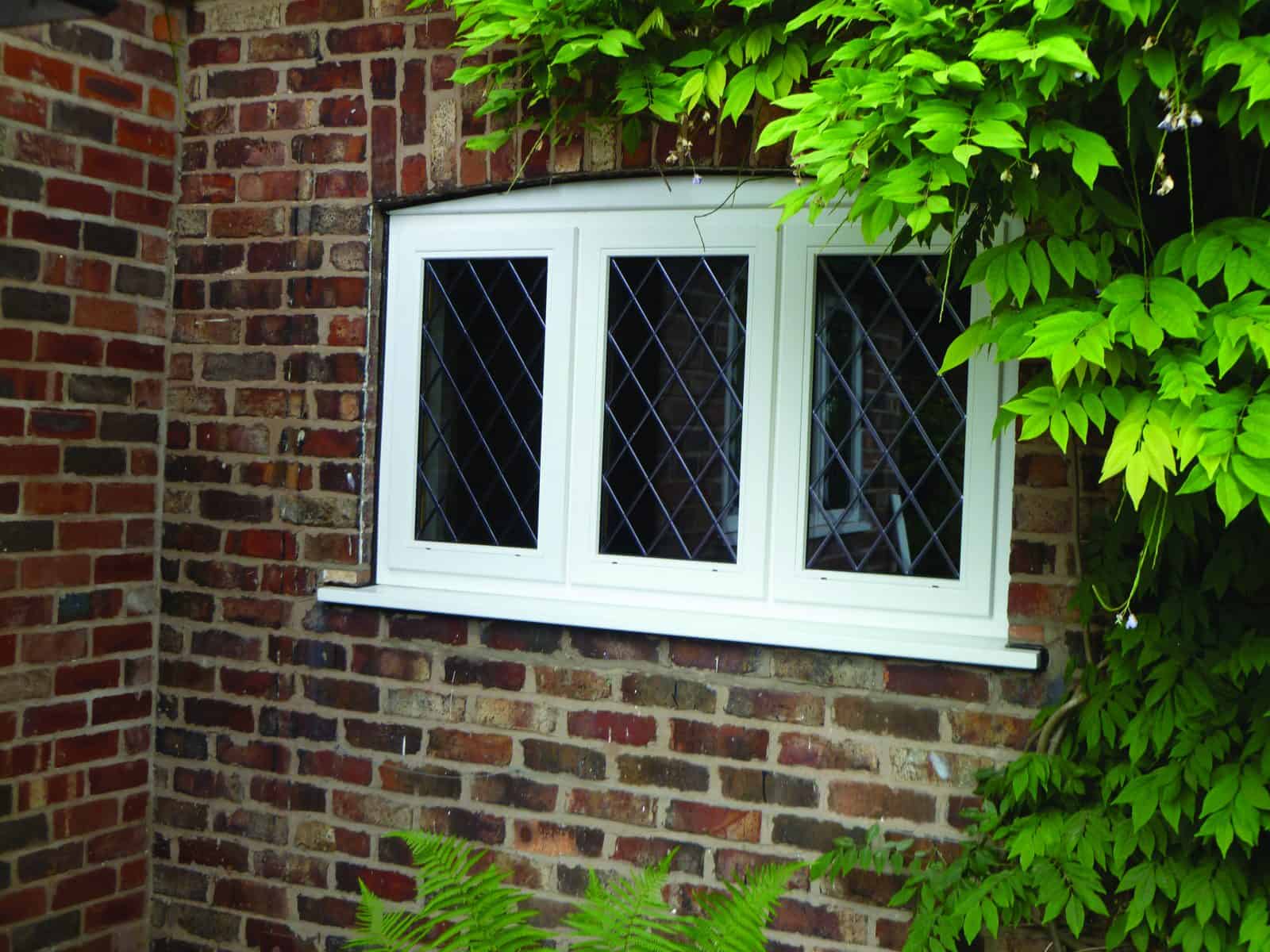White leaded windows in engineered timber - Reddish Joinery